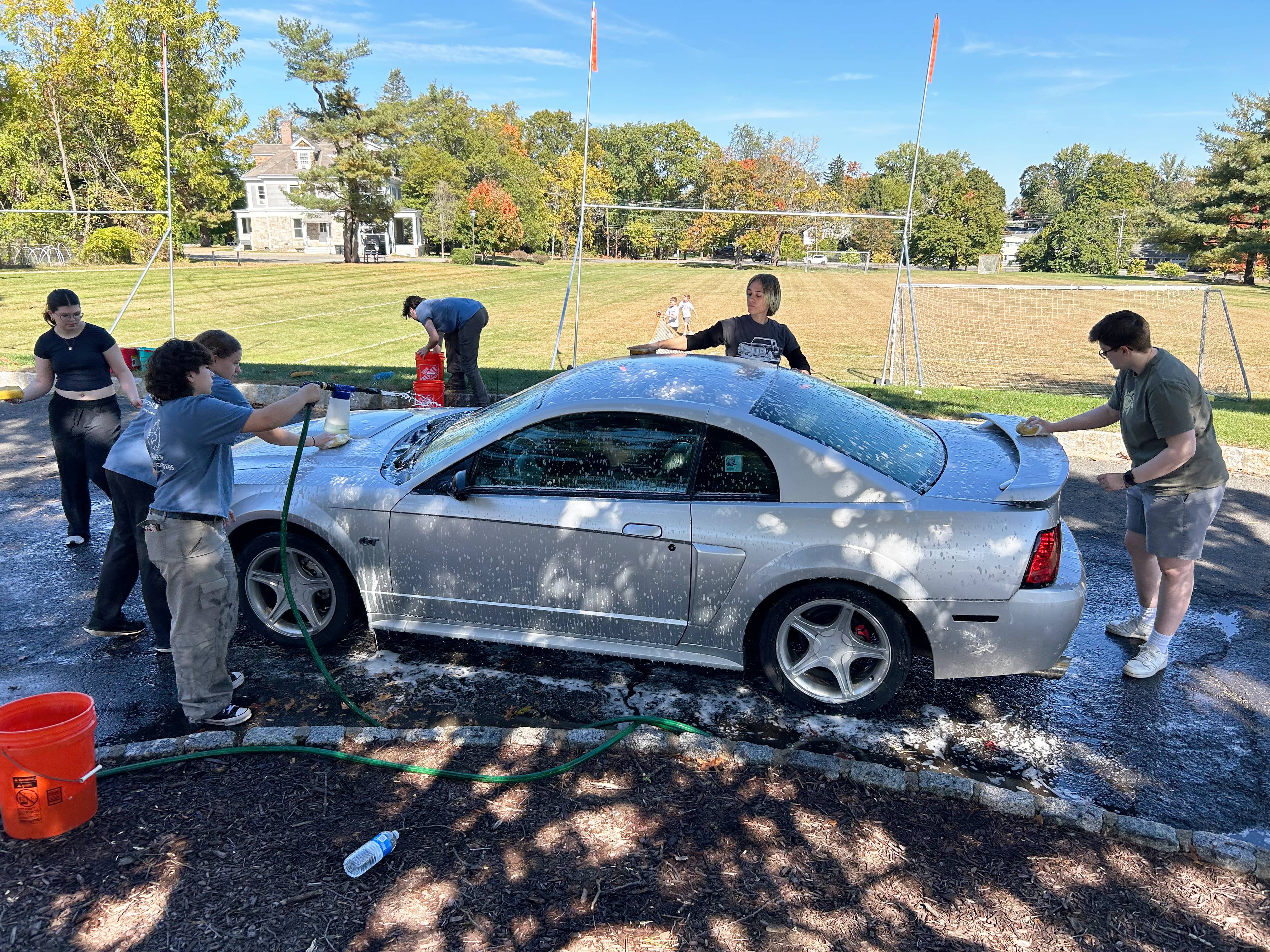 Volunteer Without Borders Washes “Vehicles Without Borders” in Car Wash ...